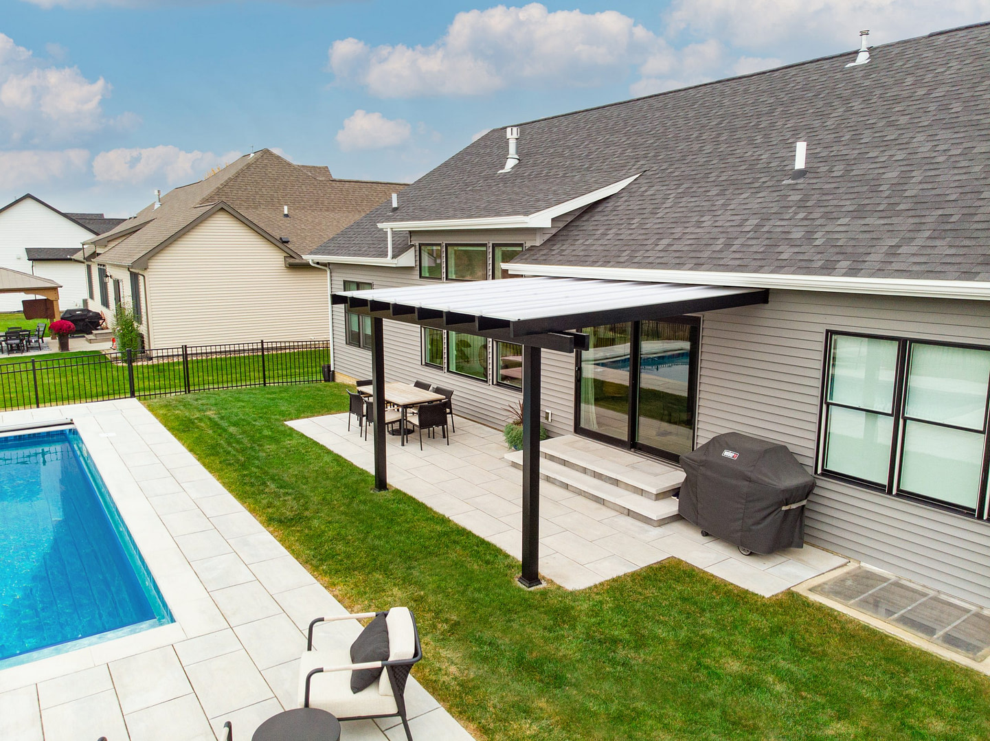 Elements 20x20 Attached Rain Proof Pergola - Black | Heartland Pergolas