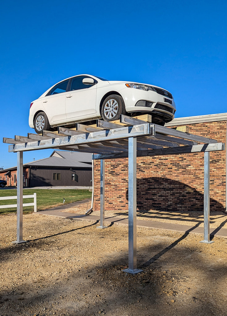 Elements 12x16 Freestanding Rain Proof Pergola - Black | Heartland Pergolas